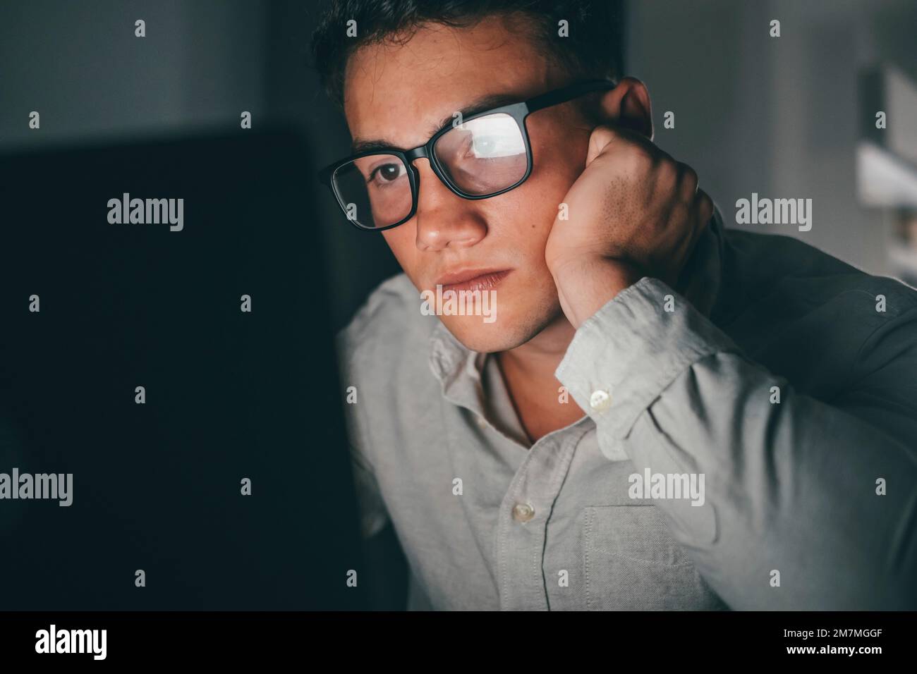 Close up and portrait of one young teenager studying and working at ...