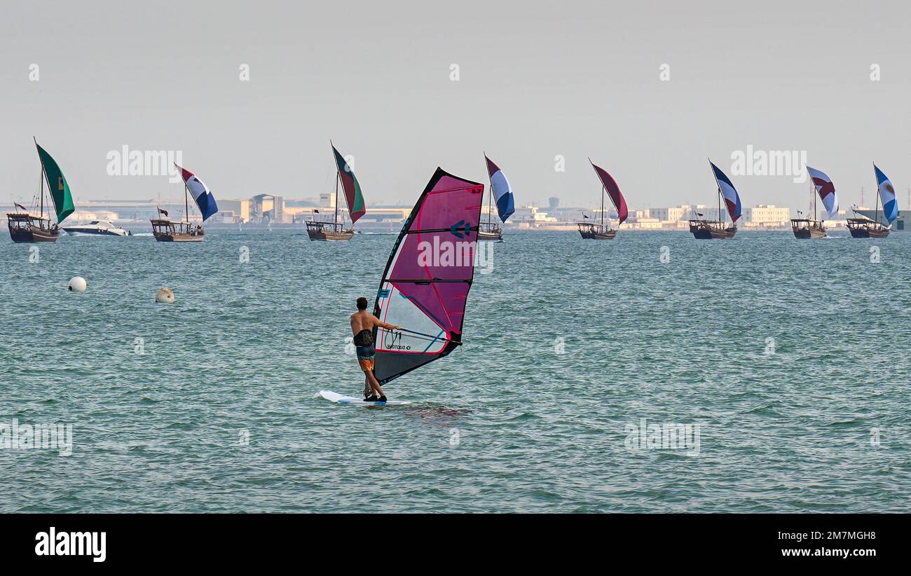 Ships sail with sails in the colors of the remaining quarterfinal teams ...