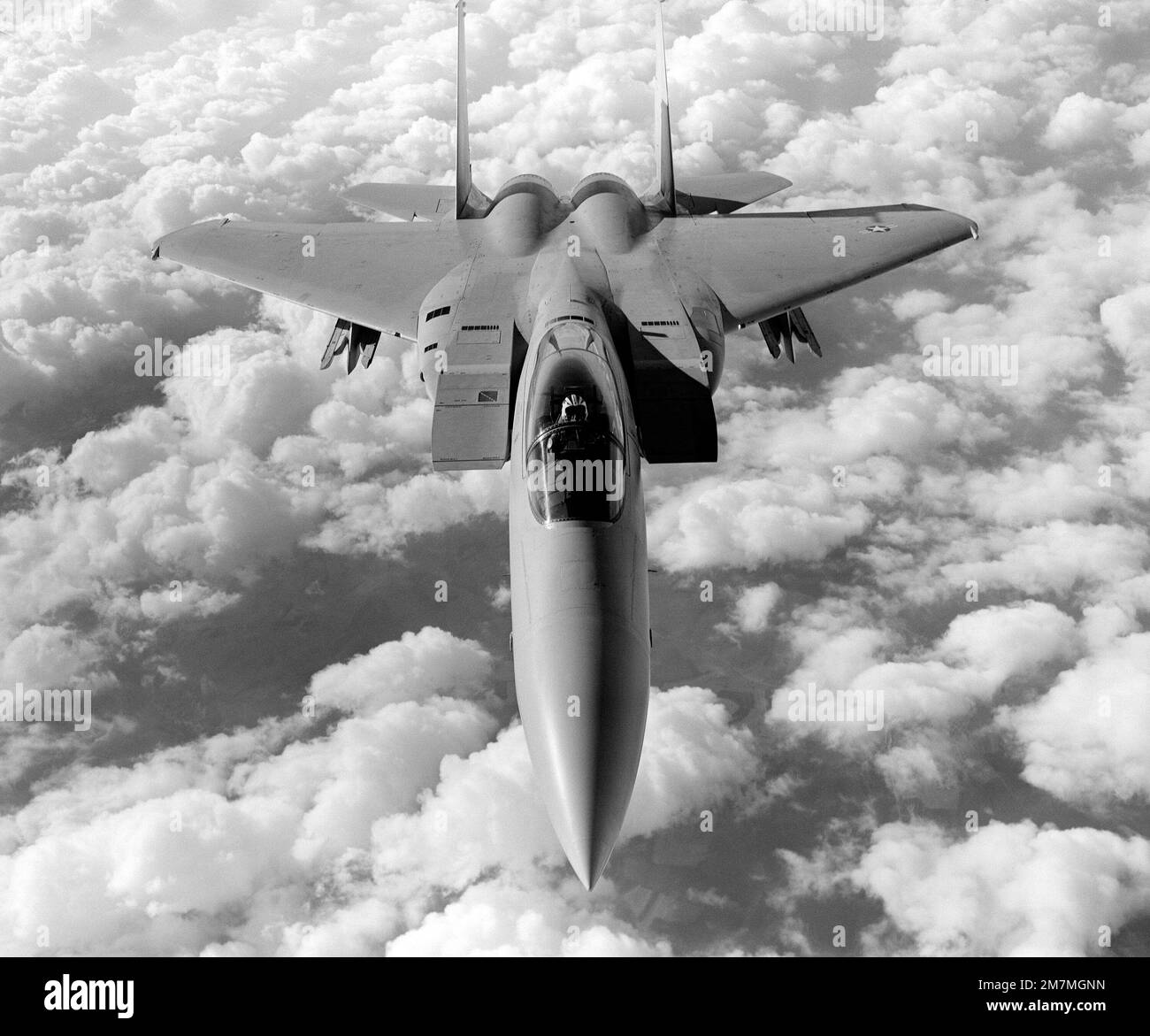 An air-to-air head-on view of an F-15 Eagle aircraft. Country: Unknown ...
