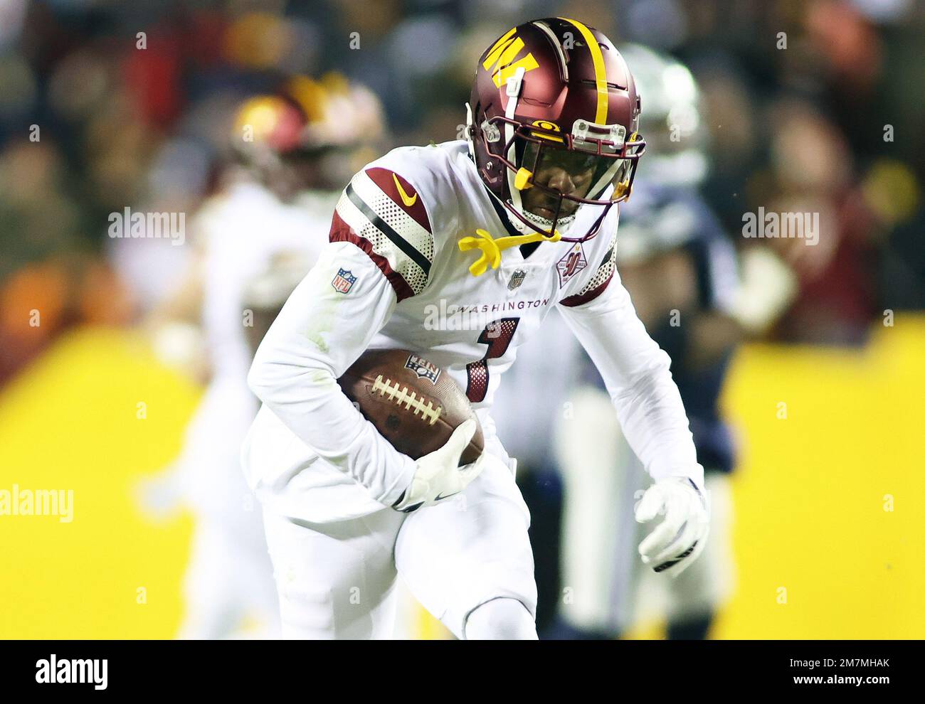 Washington Commanders wide receiver Jahan Dotson (1) runs during an NFL ...