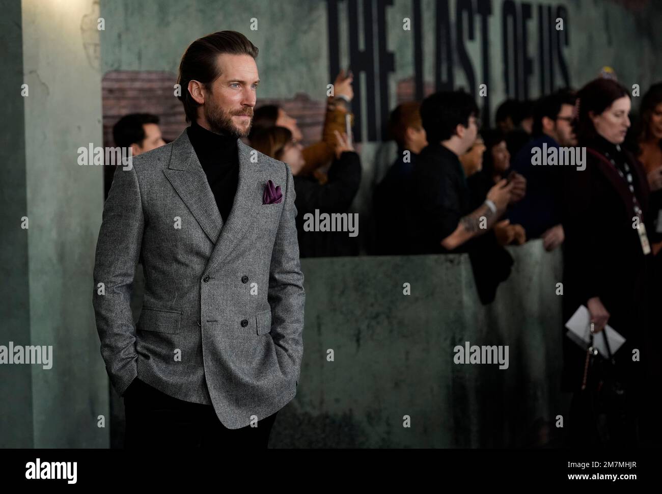 Troy Baker poses at the premiere of the HBO series "The Last of Us ...
