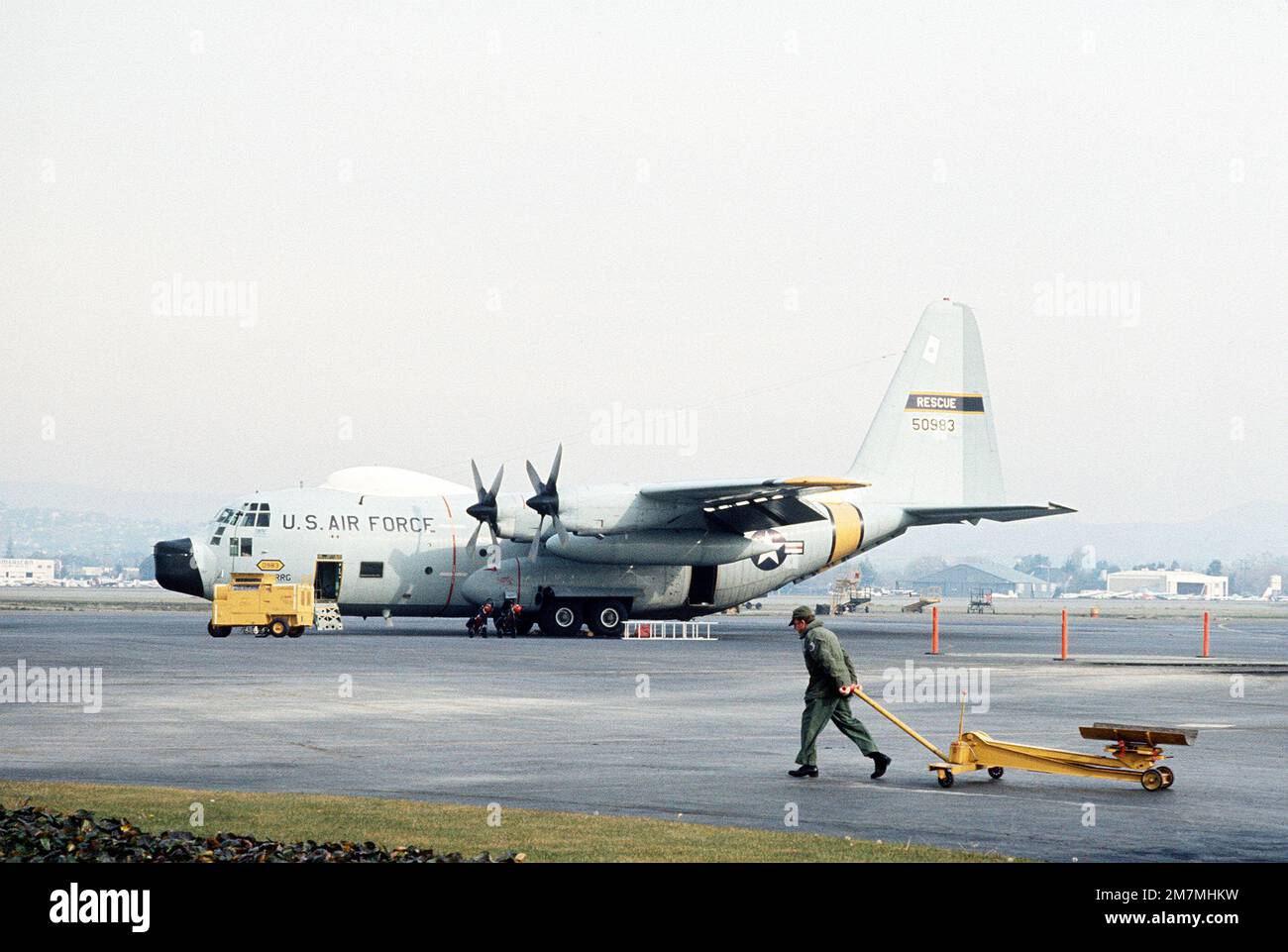 A left side view of an RC-130 Hercules aircraft on the flightline prior ...
