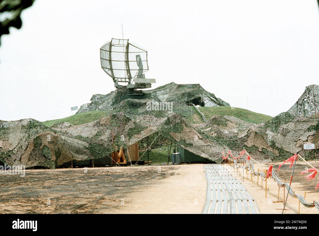 A view of a camouflaged AN/TPS-43 tactical 3-D radar antenna located ...