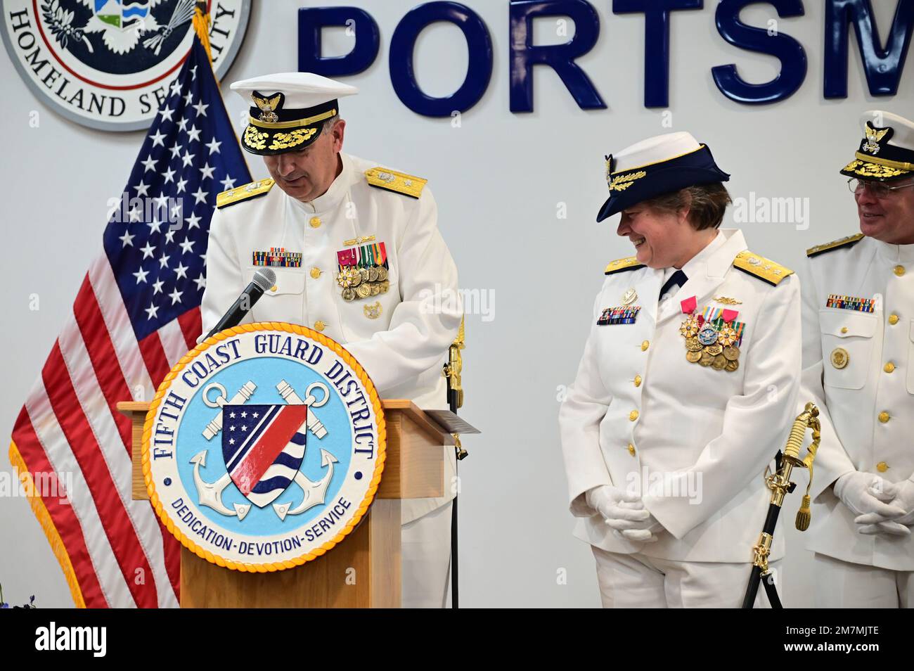 Rear Adm. Shannon Gilreath, incoming 5th District commander, reads his ...