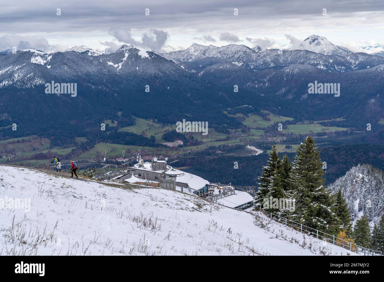 Hikers climb from brauneck mountain station hi-res stock photography ...