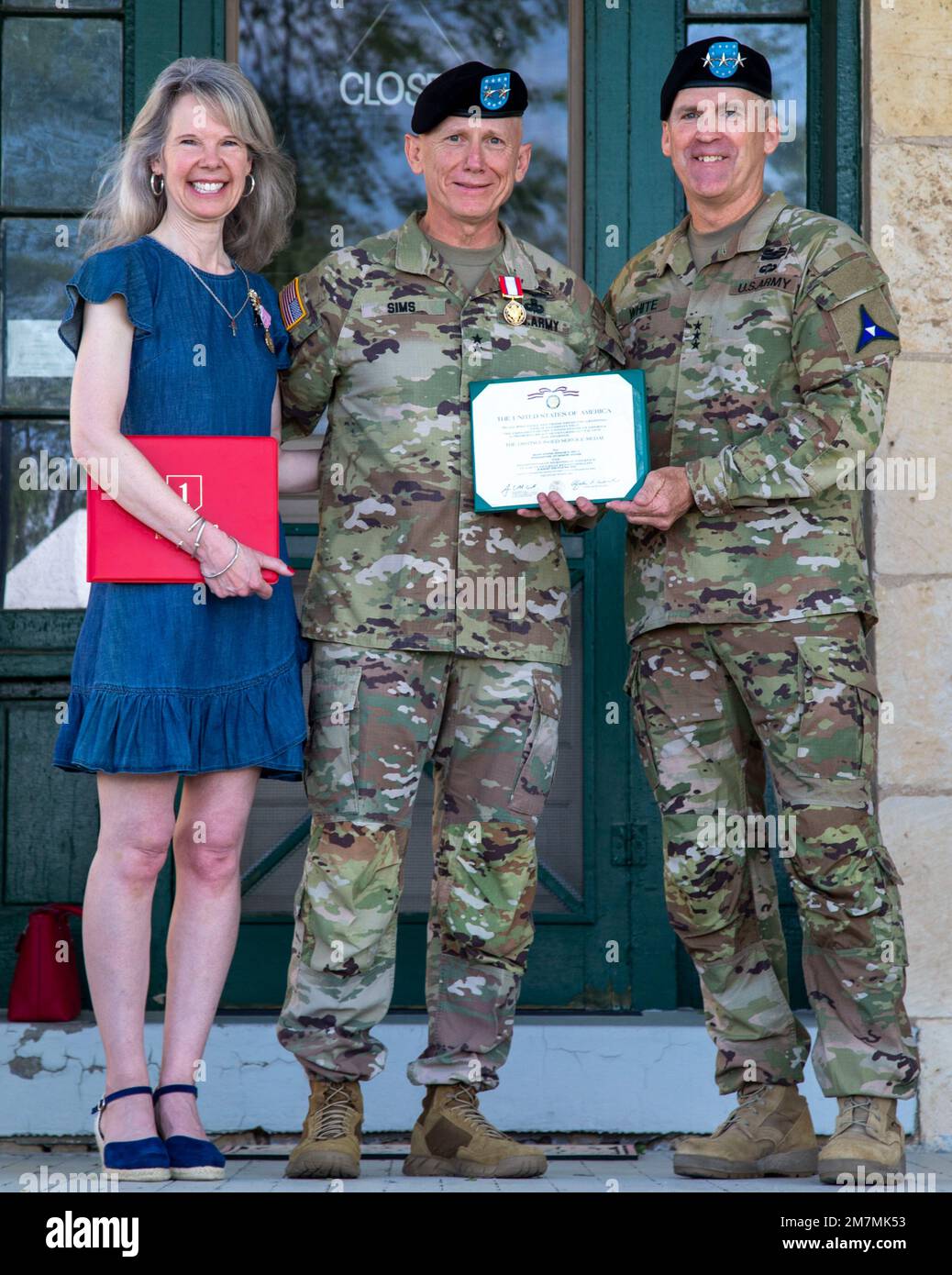U.S. Army Maj. Gen. D.A. Sims II (center), the outgoing 1st Infantry ...