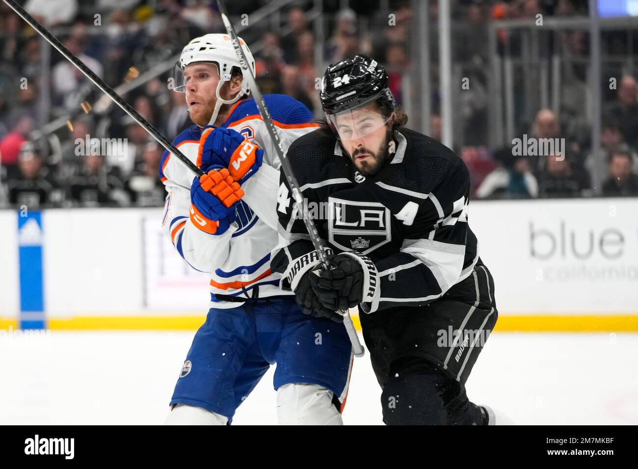 Los Angeles Kings' Phillip Danault (24) collides with Edmonton Oilers ...