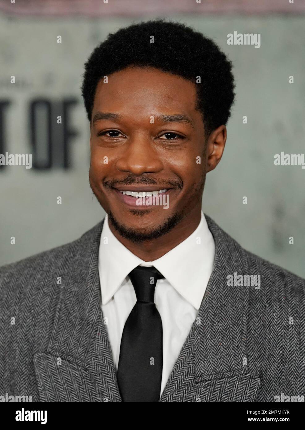 Lamar Johnson poses at the premiere of the HBO series "The Last of Us ...