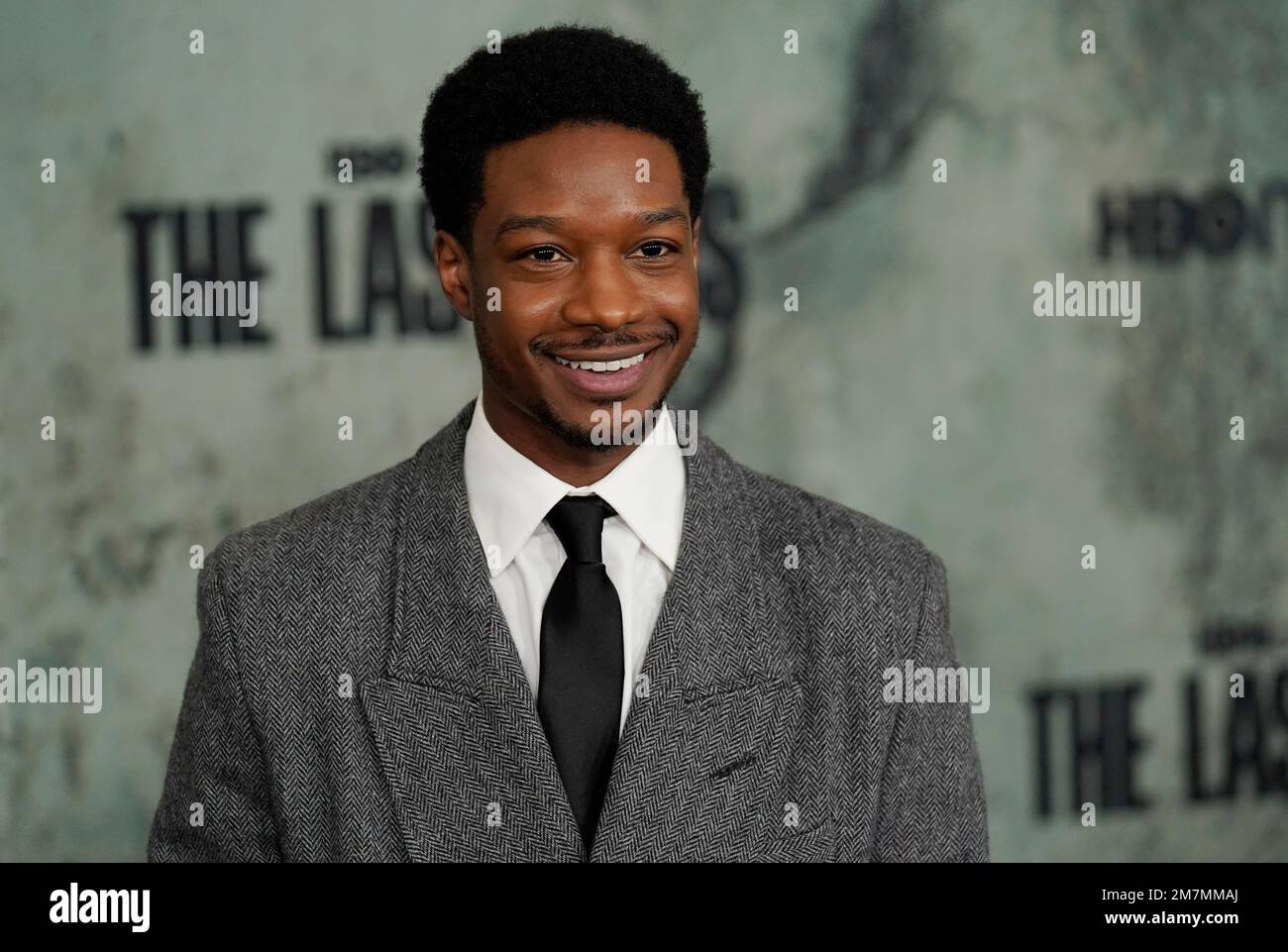Lamar Johnson poses at the premiere of the HBO series "The Last of Us ...