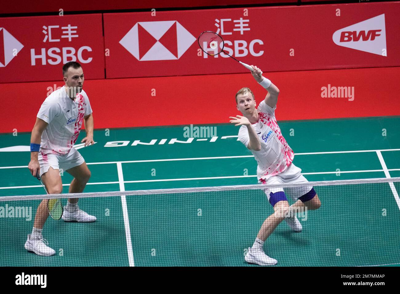 Denmark's Kim Astrup, right and Anders Skaarup Rasmussencompete against ...