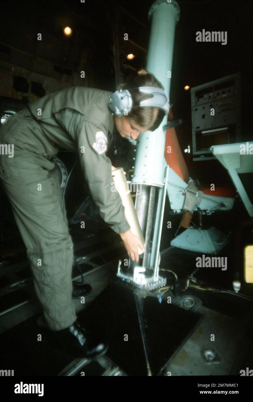SGT. Debbie Whitacre, 54th Weather Reconnaissance Squadron, prepares to ...
