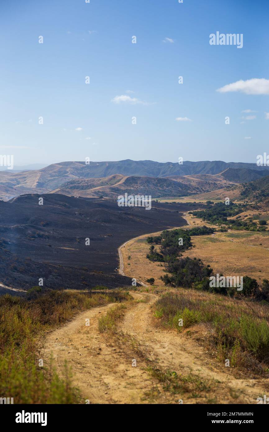 Smoke rises from a burned section of Artillery Firing Area 8 on Marine ...