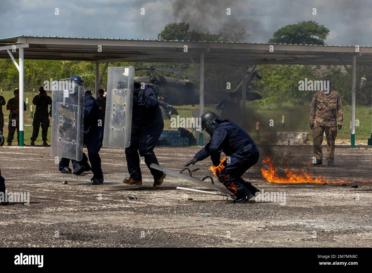 BELMOPAN, Belize (May 11, 2022) Police officers and service members ...