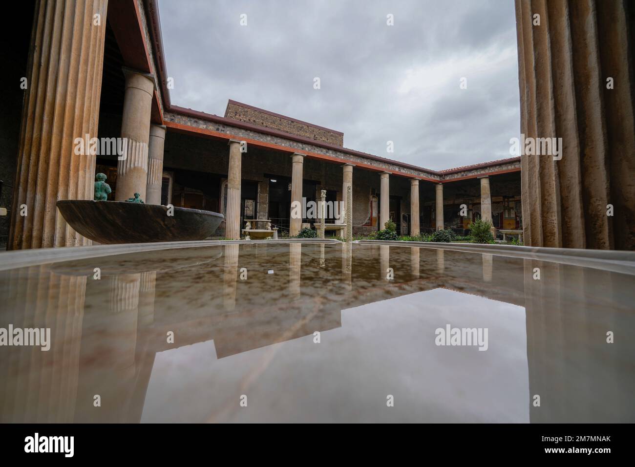 The 'peristylium', or courtyard, is reflected in the water contained in ...