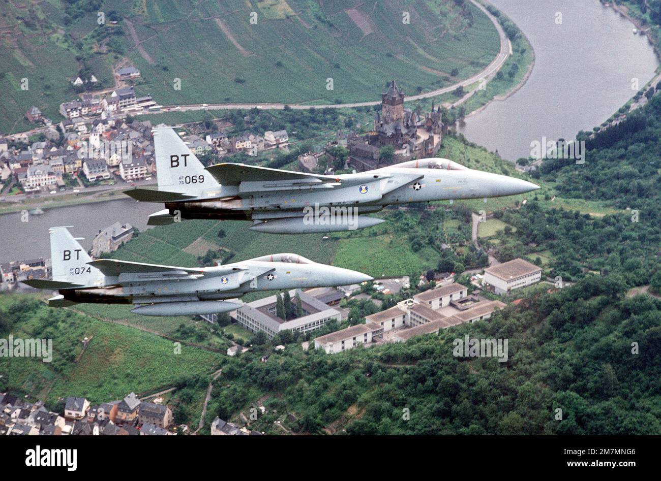A right side view of two F-15 Eagle aircraft, from the 36th Tactical ...
