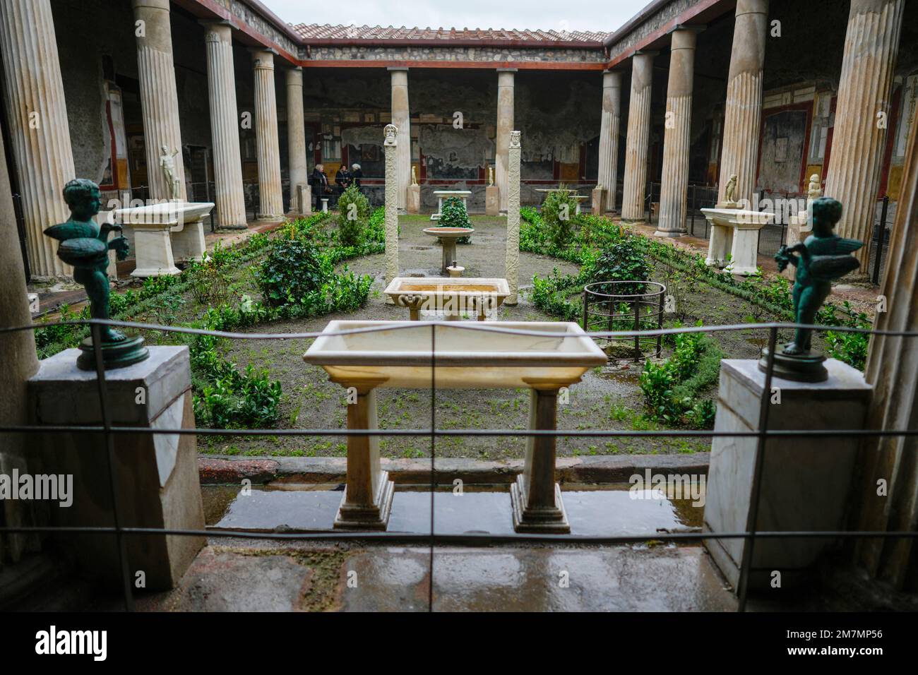Colums frame the 'peristylium', or courtyard, in the center of the ...