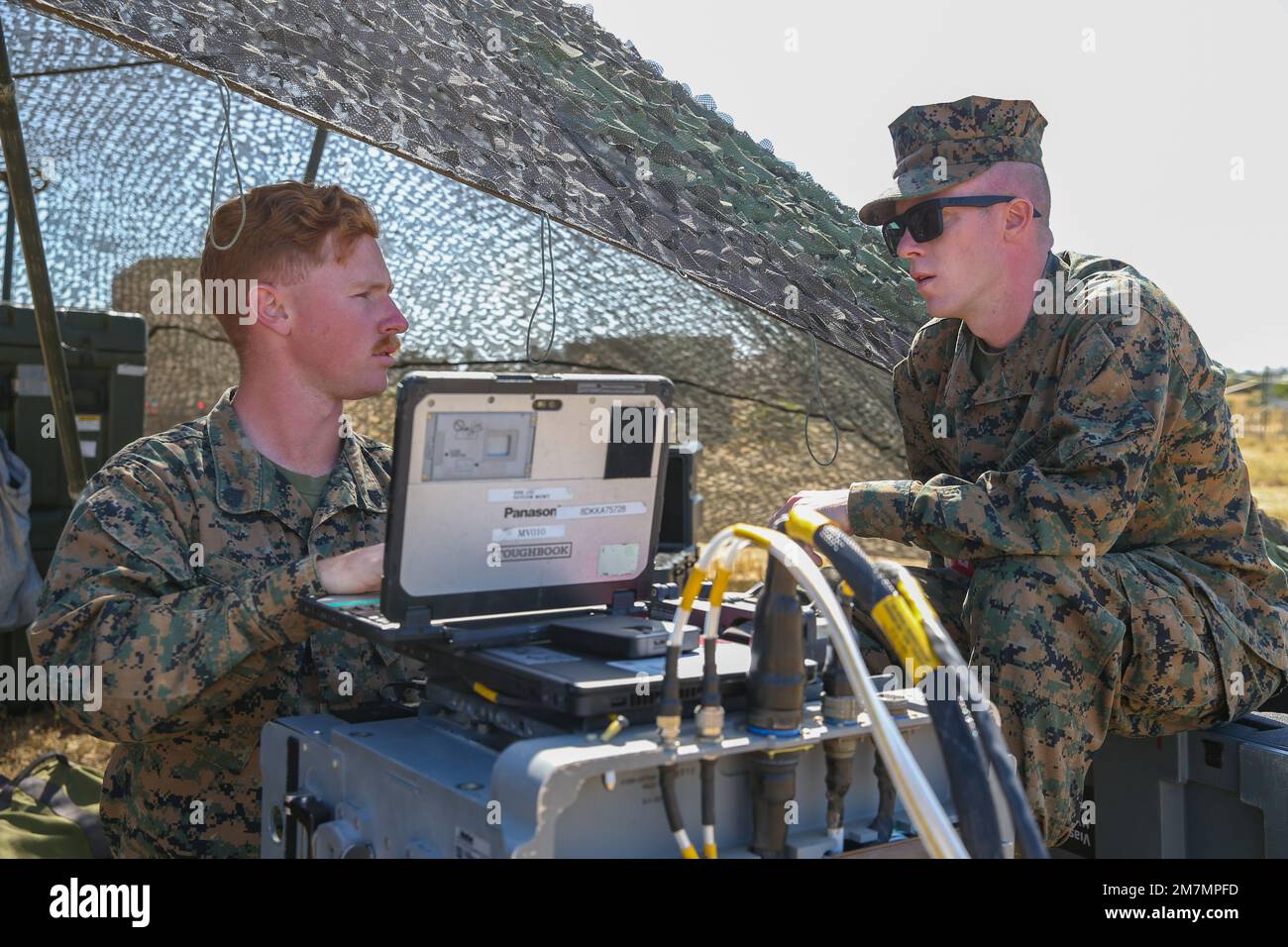 U.S. Marine Corps Sgt. Louis Hall, left, a radio operator, and Sgt ...