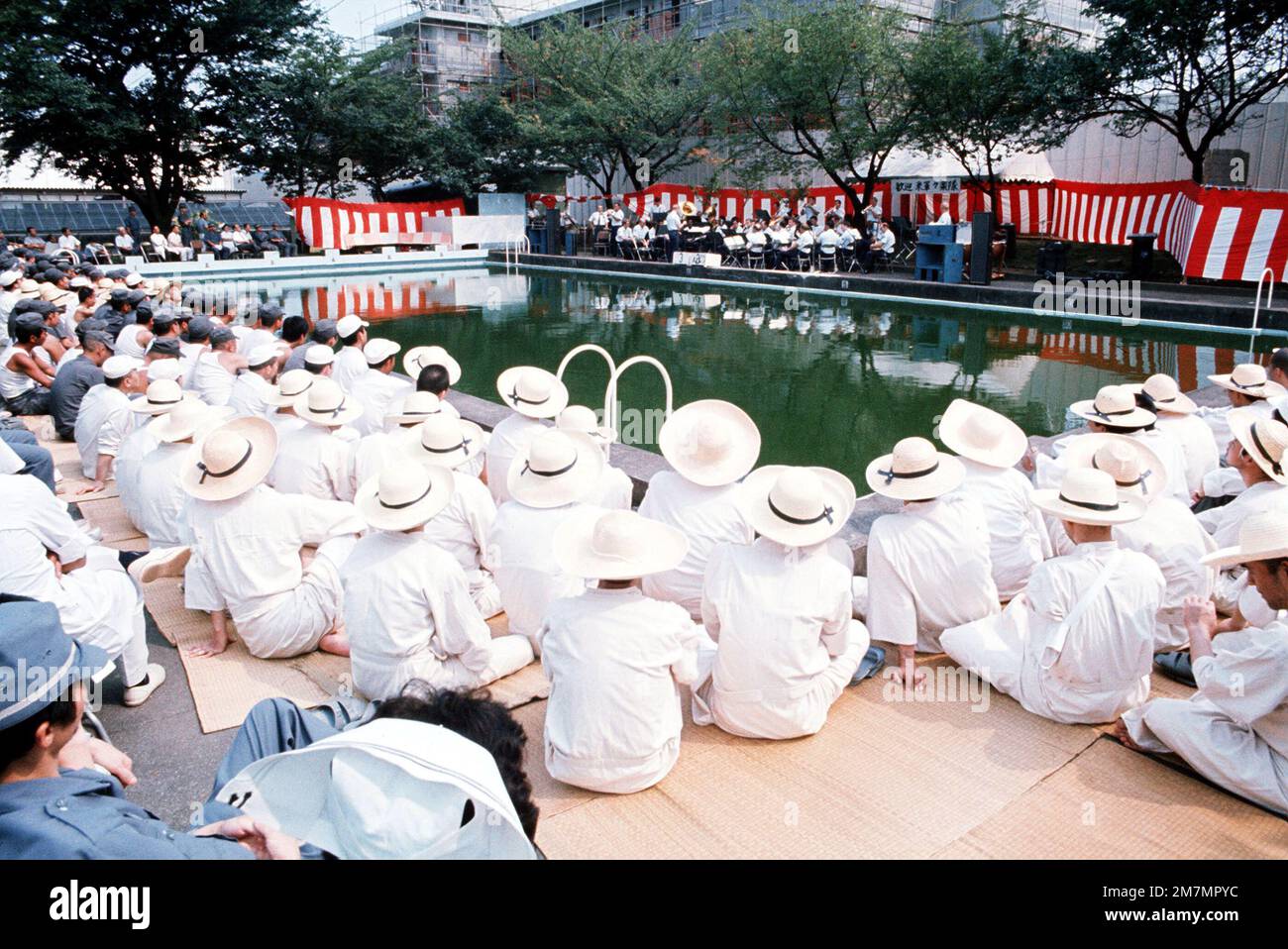 The US Air Force Band of the Pacific gives a poolside concert at the ...