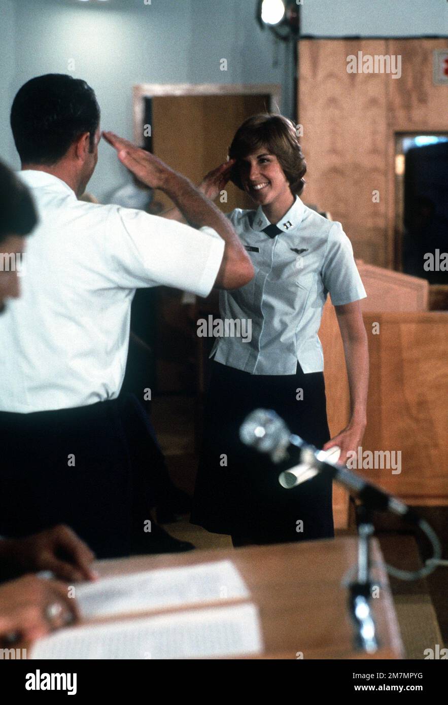 CPT Connie Engel receives her diploma during the graduating ceremony ...