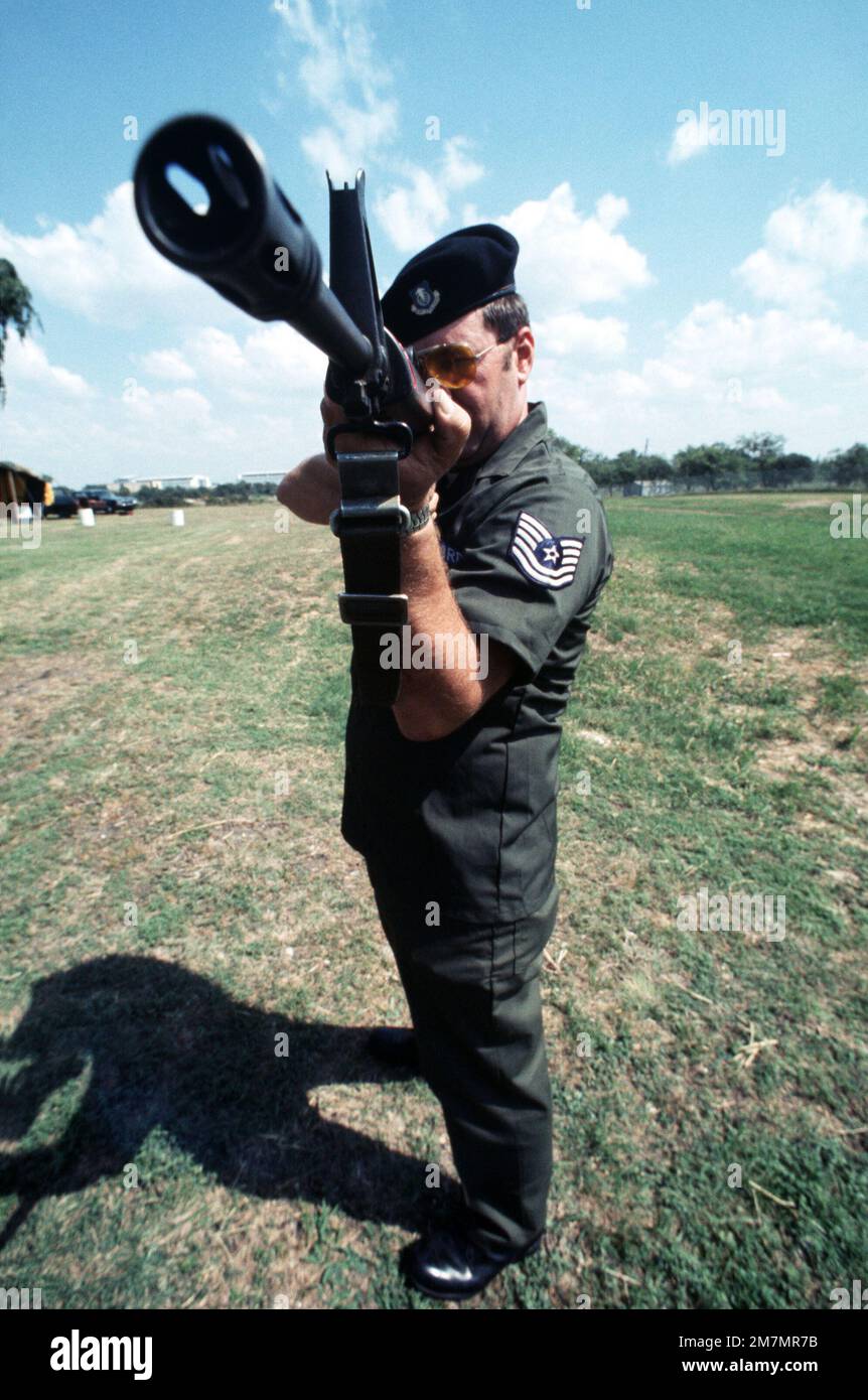 Technical Sergeant Donald D. Tolly, a US Air Force gunsmith from ...