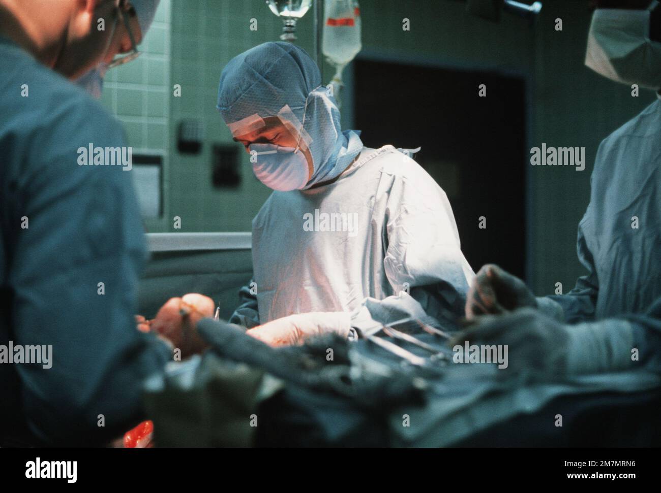 Dr. Theodore Neric, chief resident physician, performs plastic surgery ...