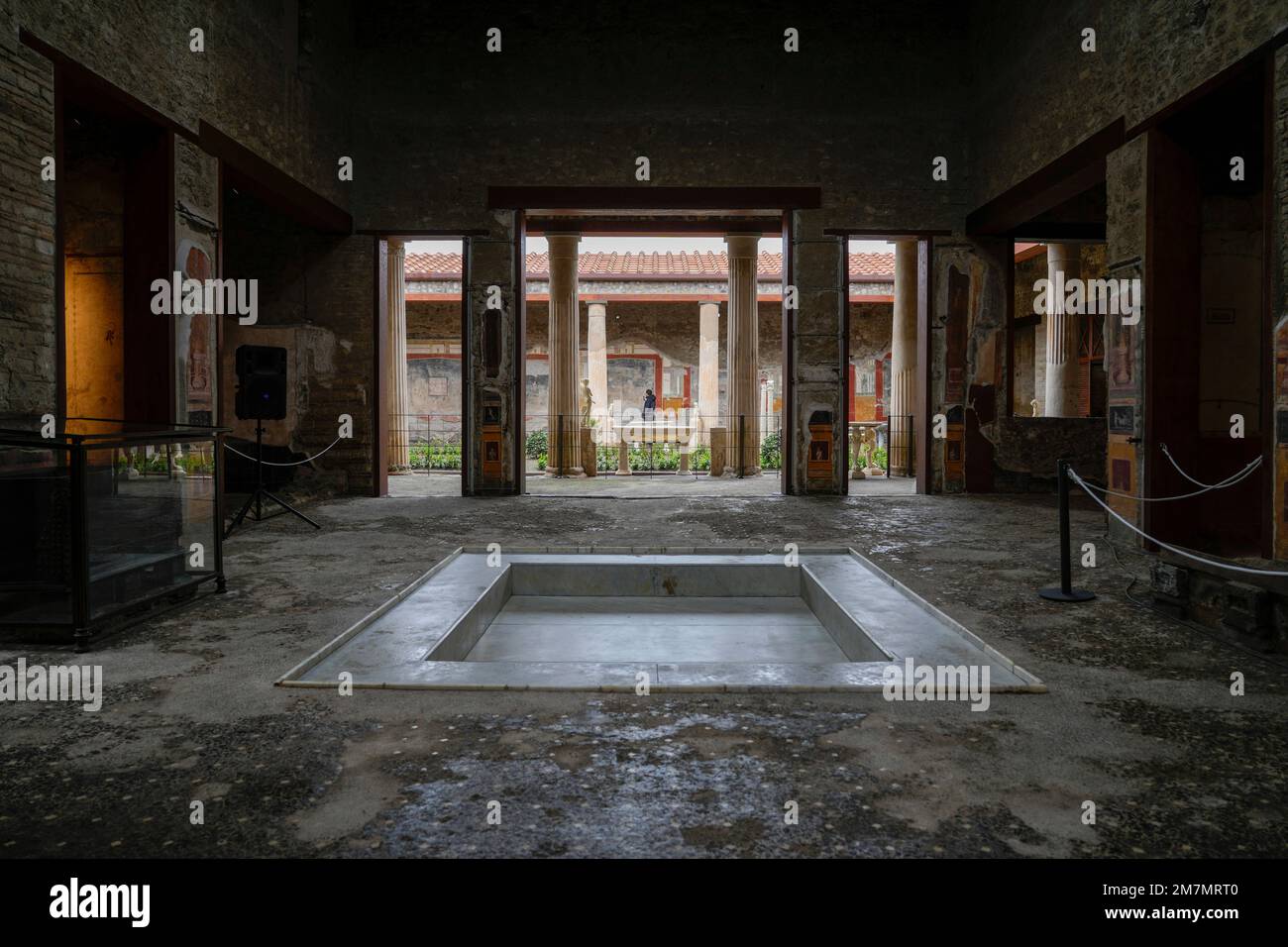 A view of the impluvium, the rain water-catchment pool in the atrium of ...