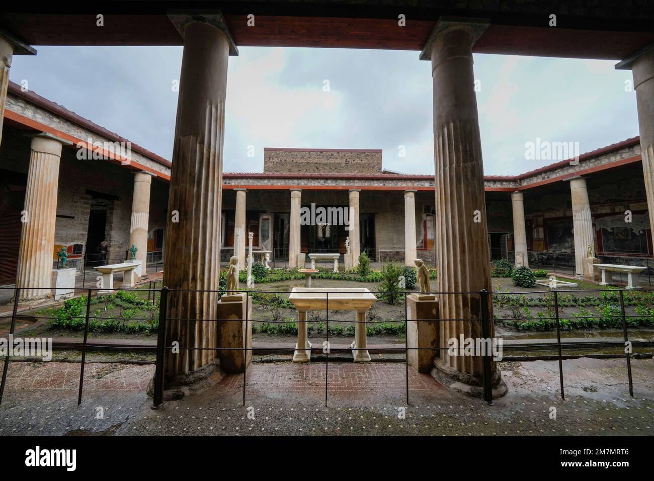 Colums frame the 'peristylium', or courtyard, in the center of the ...