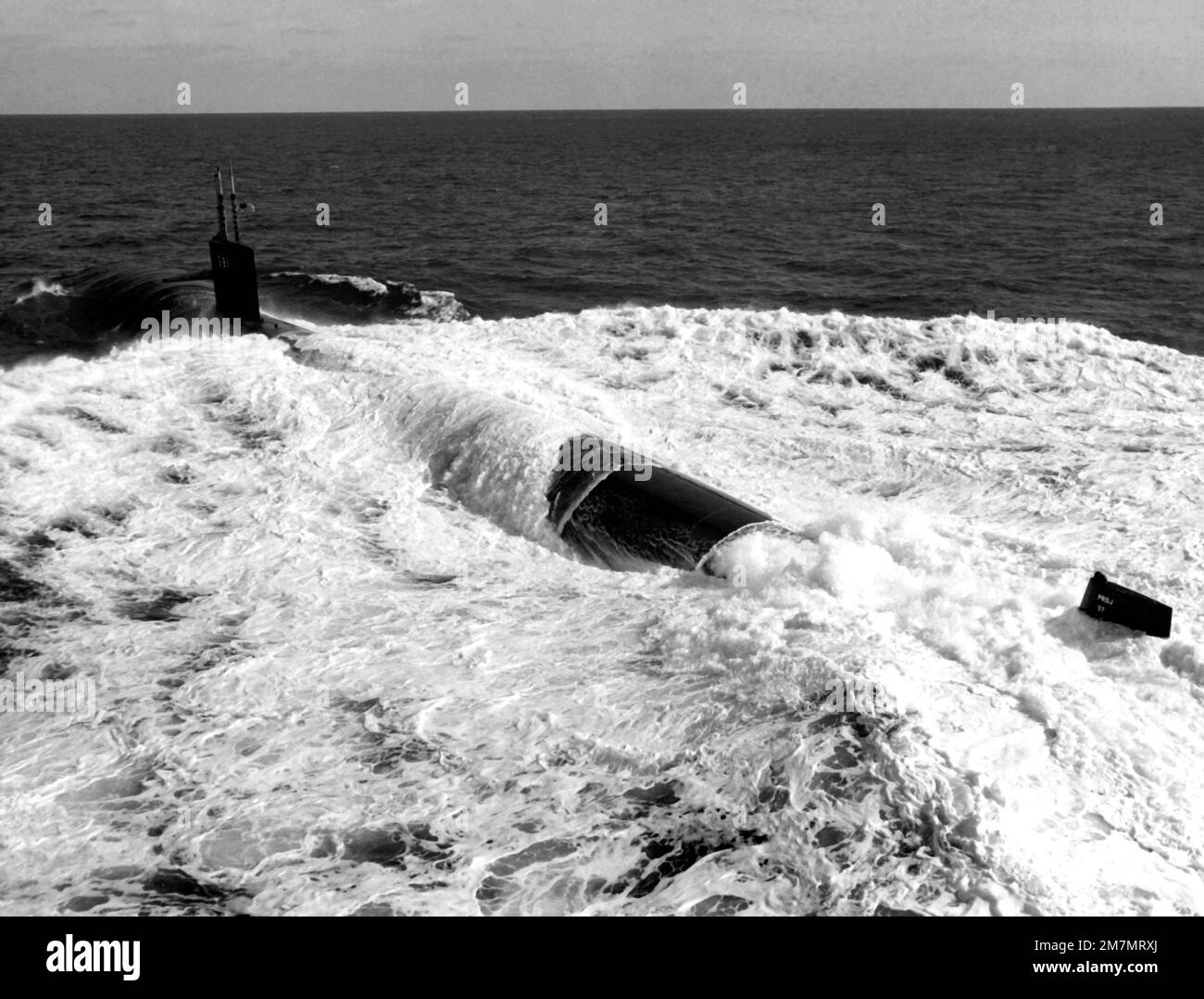Aerial port quarter view of the nuclear-powered attack submarine USS ...
