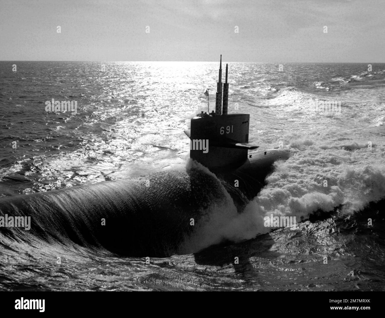 Aerial port beam view of the nuclear-powered attack submarine USS ...