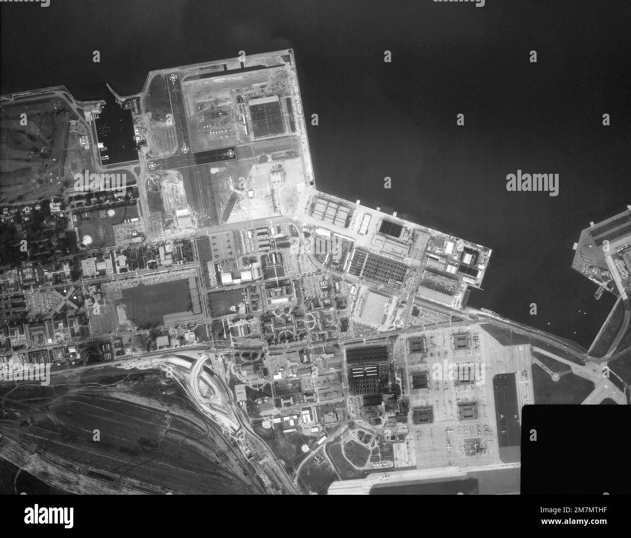 An aerial view of the Naval Air Rework Facility and the old seaplane ...