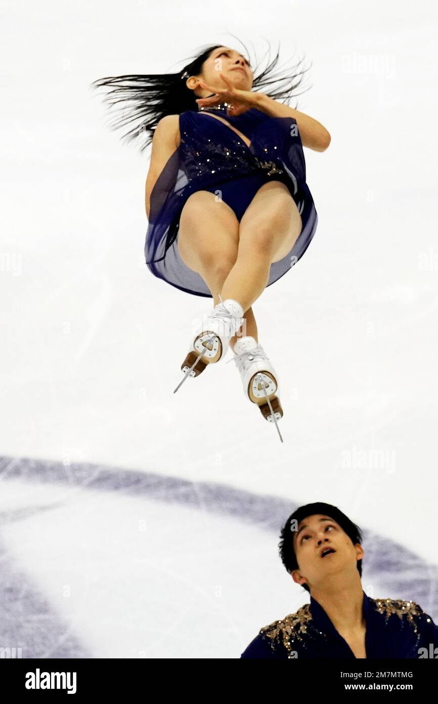 Japanese pairs figure skaters Riku Miura and Ryuichi Kihara compete in ...