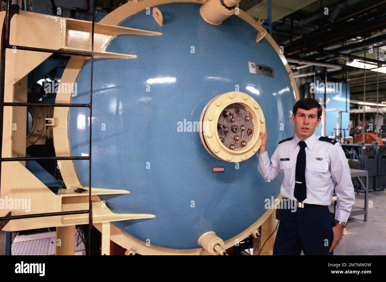 Second LT. John Wagner explains the operation of a crew escape and ...