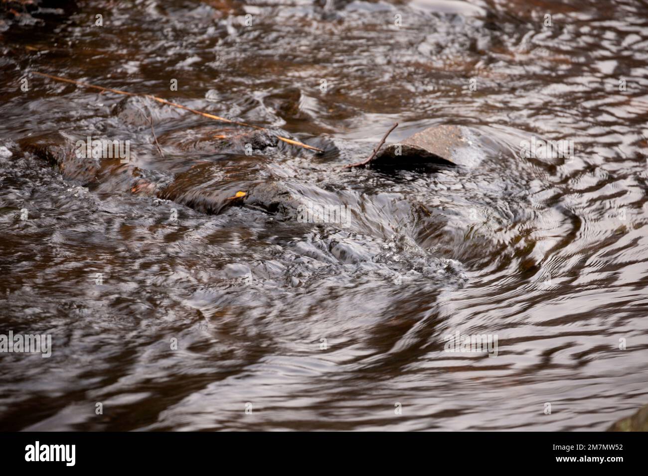 Water flowing over rocks Stock Photo - Alamy
