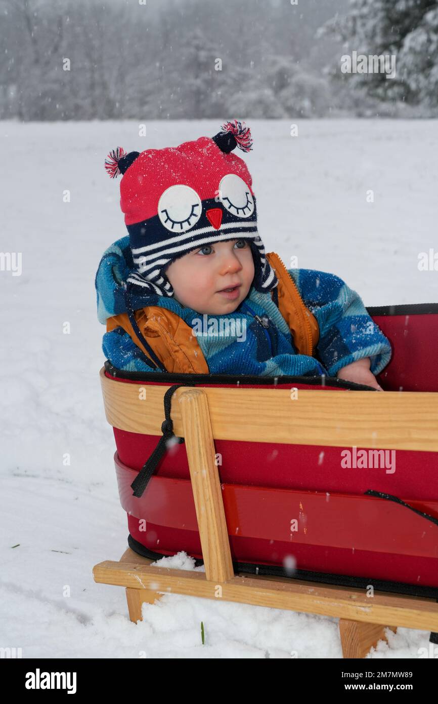 Boy sled riding hi-res stock photography and images - Alamy
