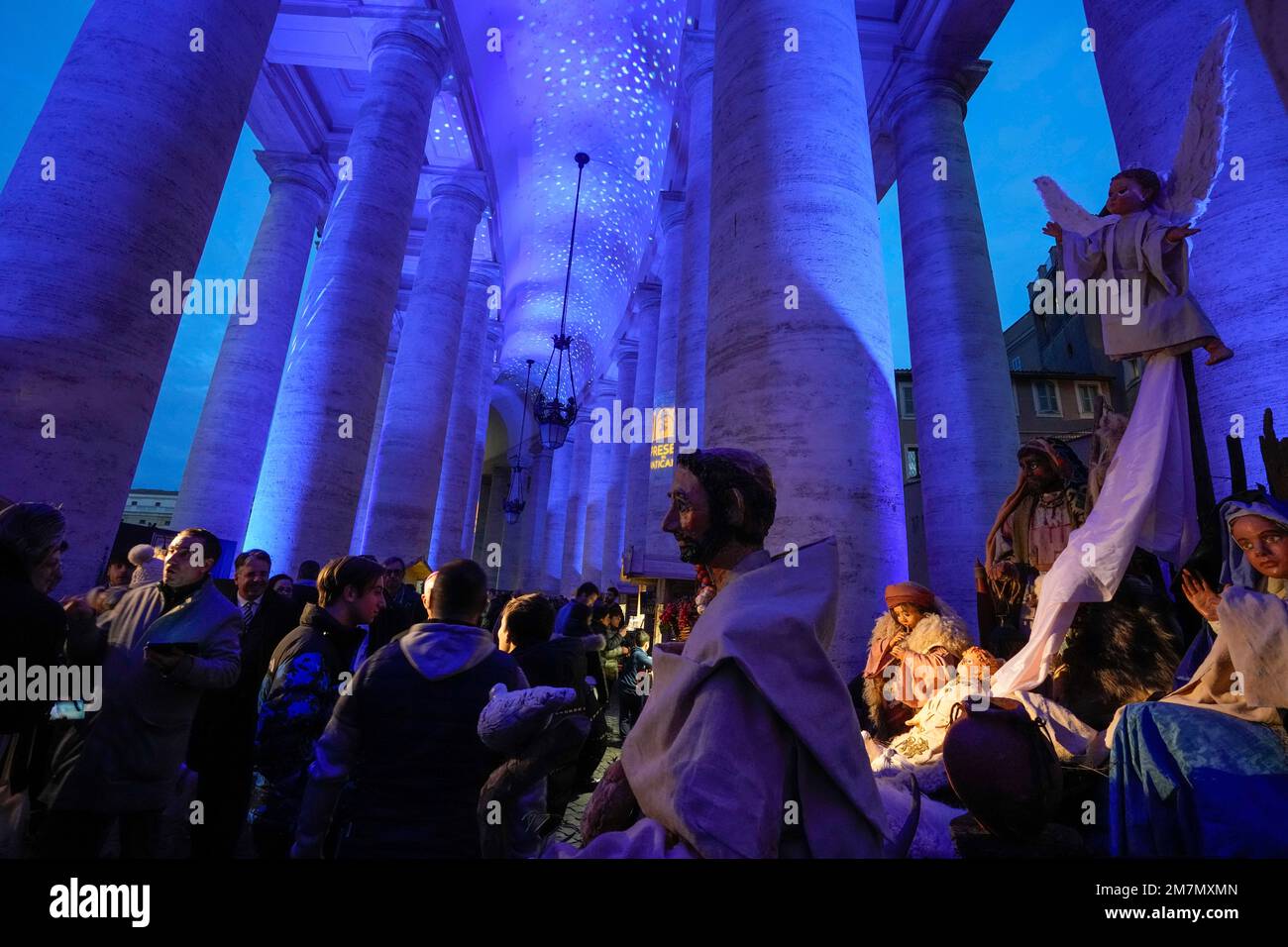Visitors admire nativity scenes part of the exhibition "100 Presepi ...