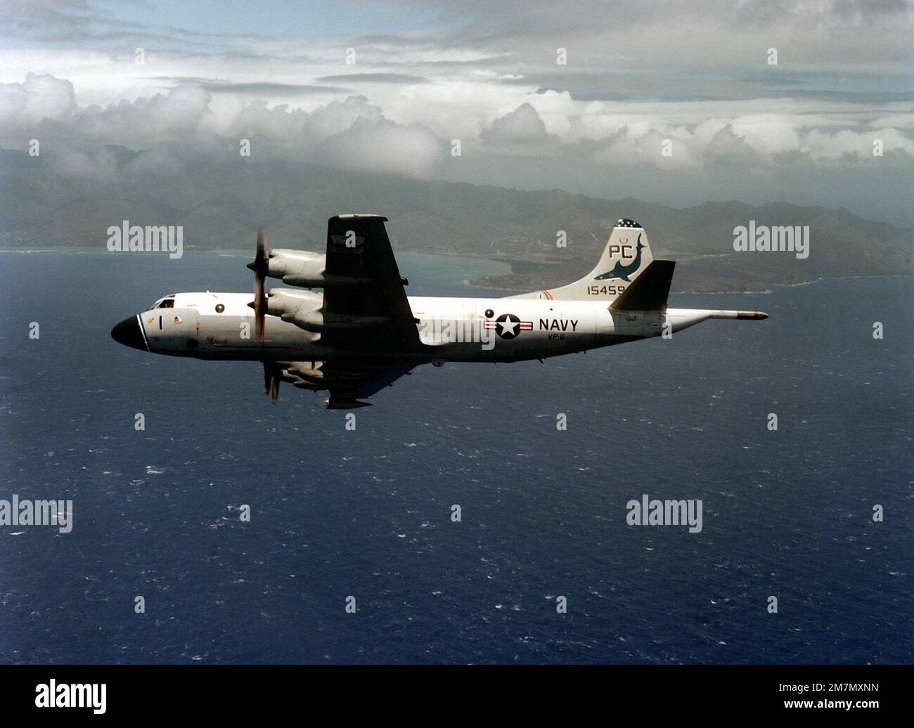An air-to-air left side view of a Patrol Squadron 6 (VP-6) P-3B Orion ...