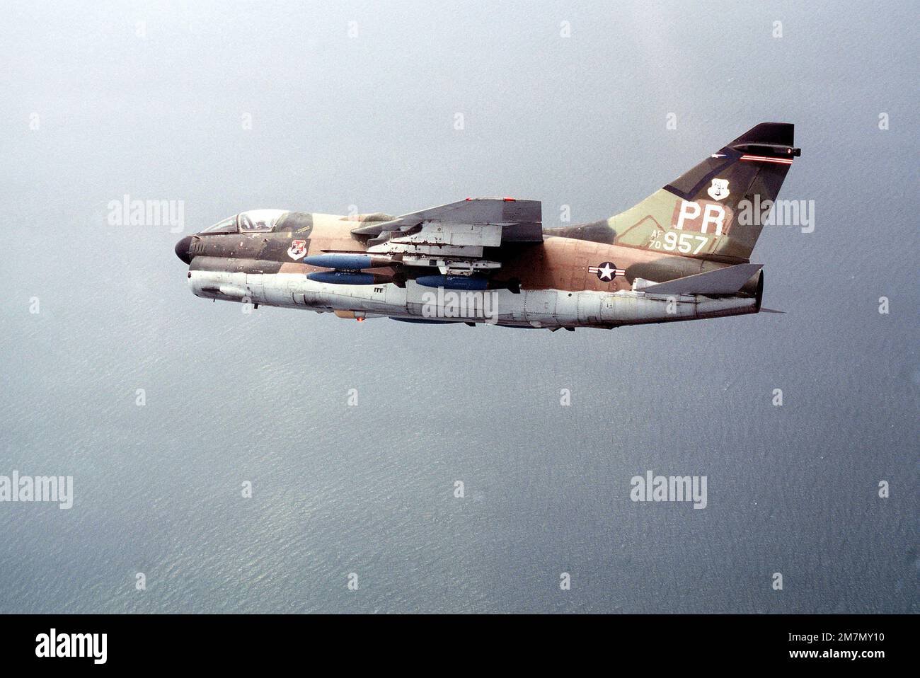 An air-to-air left side view of a Puerto Rico Air National Guard A-7D ...