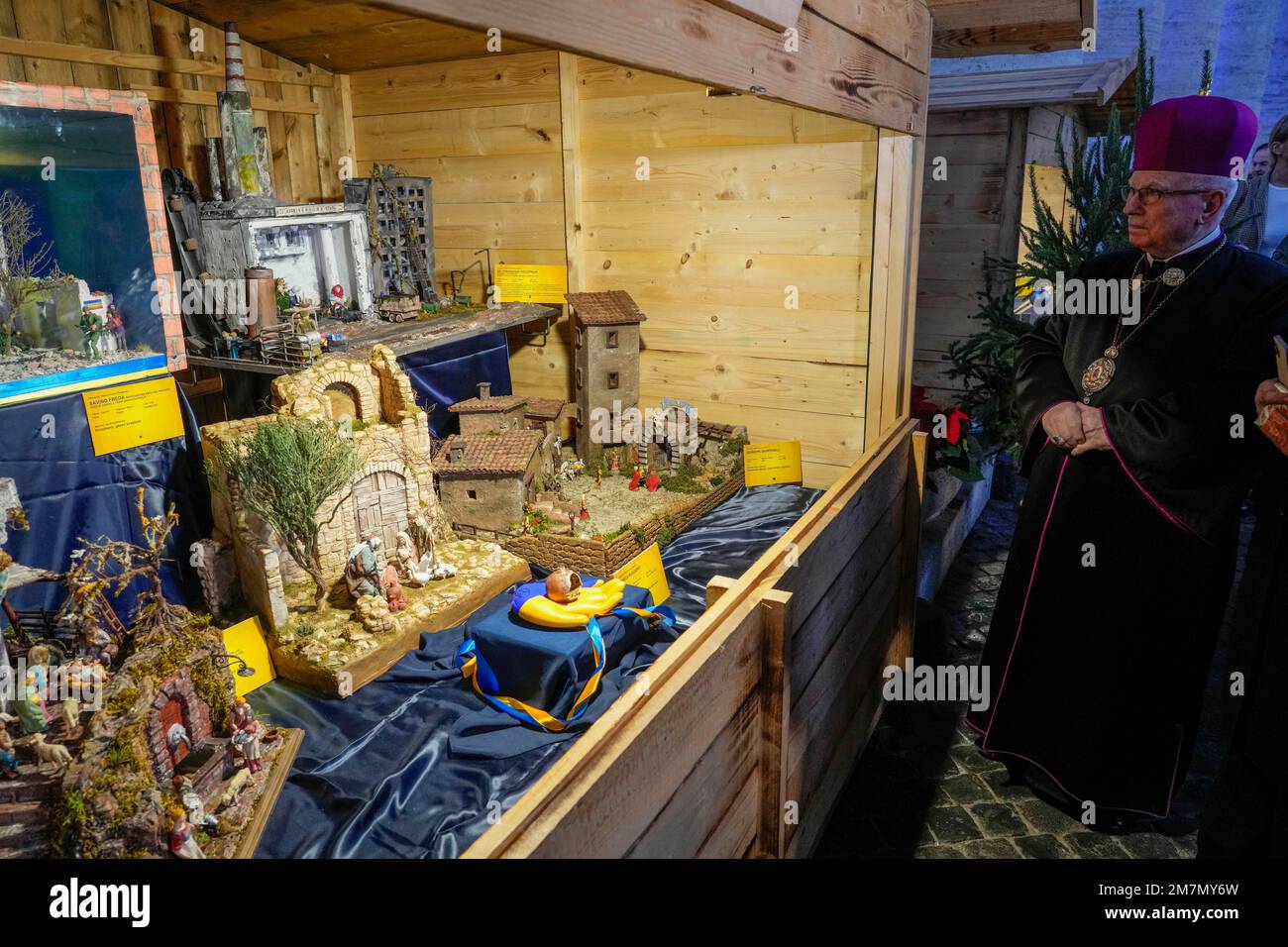 Ukrainian bishop Irynej Bilyk admires nativity scenes, the one at top ...