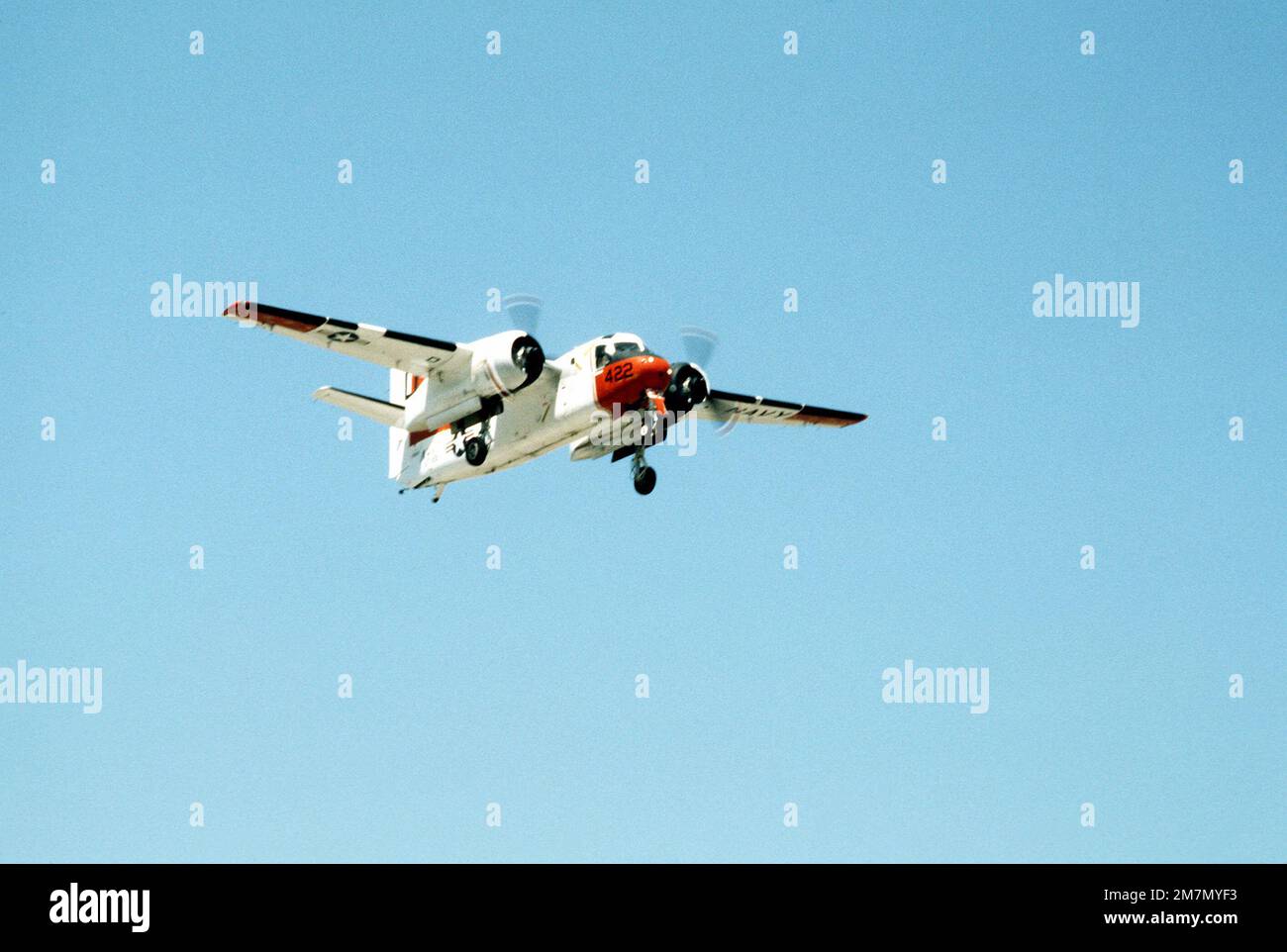 A right front view of an S-2 Tracker aircraft approaching the runway ...