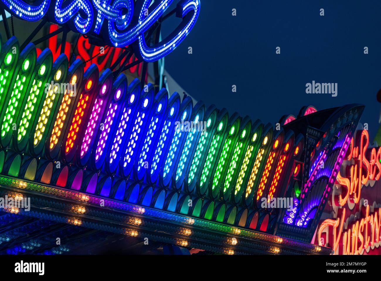 colorful lights at the Oktoberfest, Wiesn, Munich, Bavaria, folk ...