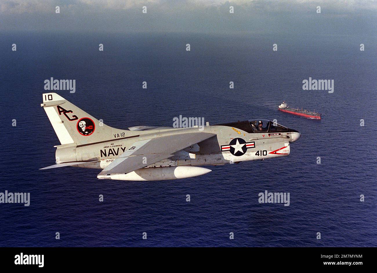 An air-to-air right side view of an Attack Squadron 12 (VA-12) A-7E ...