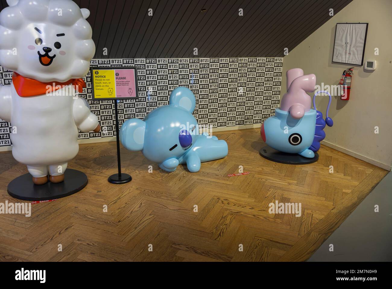 View of BT21 characters statues and warning sign not to touch them in ...