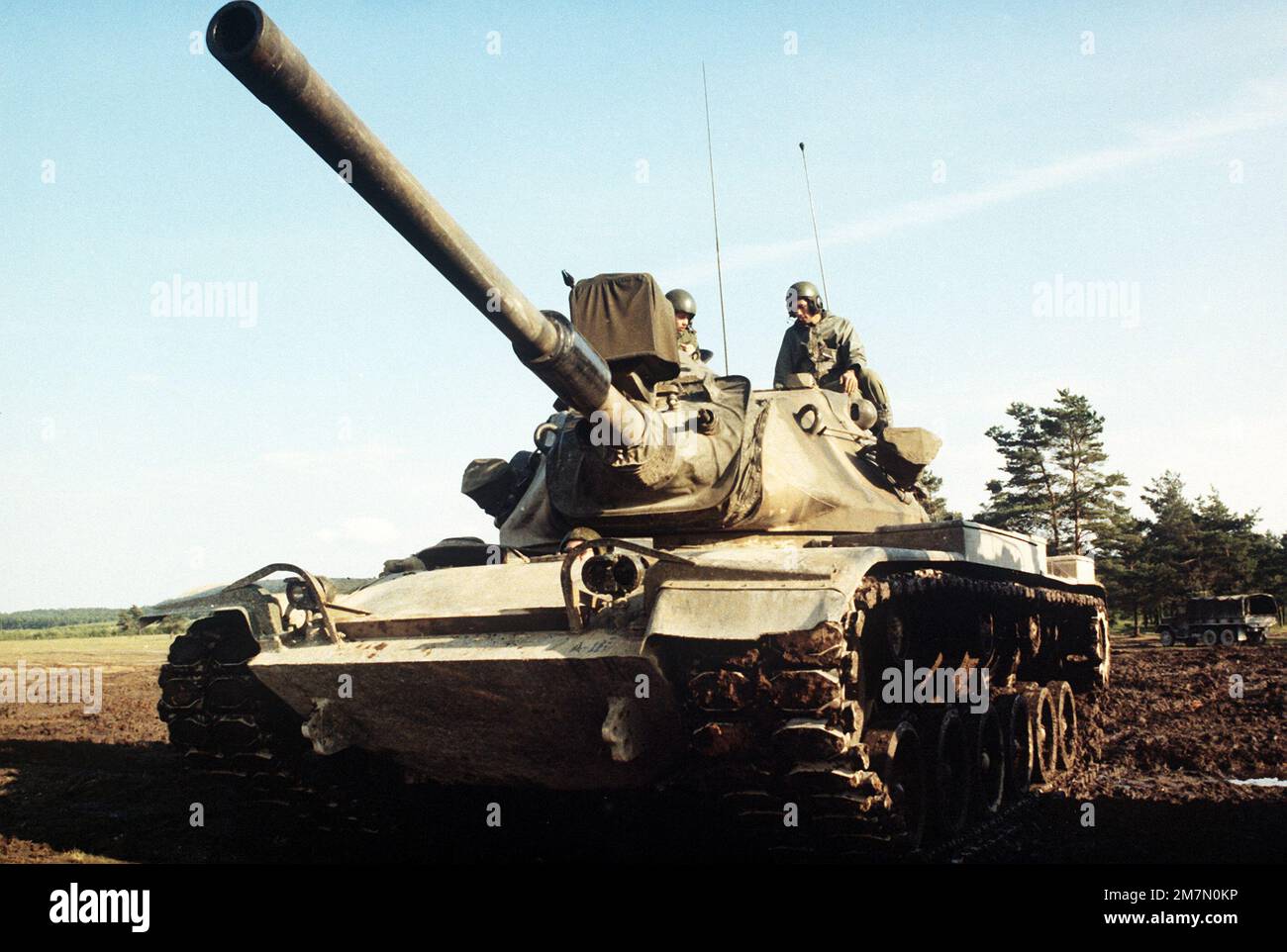 An M-60 main battle tank is operated by a member of the 157th Armor ...