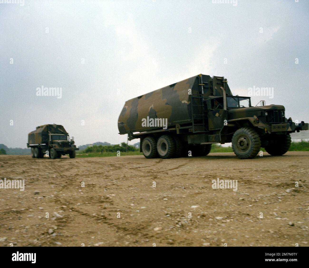 Two vehicles carrying a ribbon bridge arrived at the site where members ...