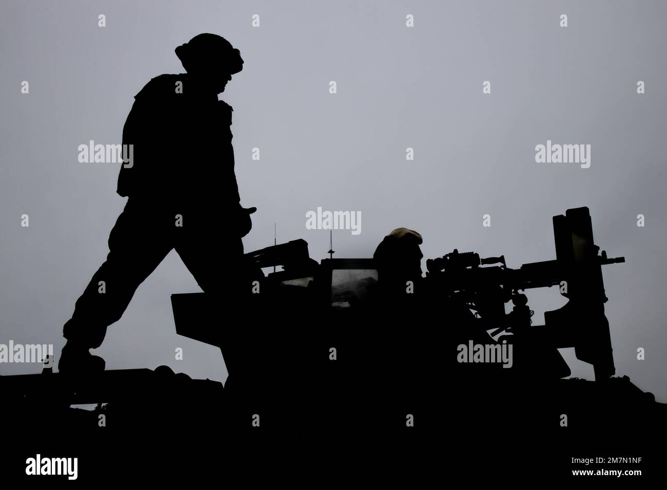 U.S. Marine Corps Sgt. Kyle Carmichael (left), a motor vehicle operator ...