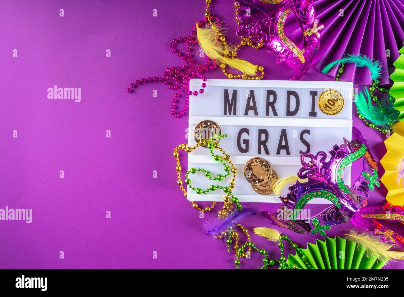 Mardi Gras colorful holiday greeting card background with festival ...