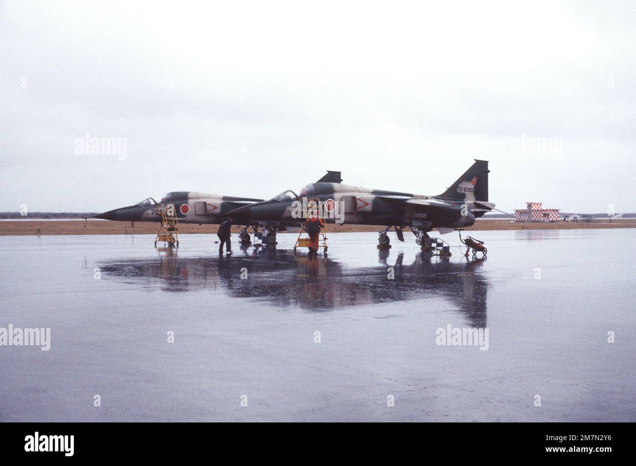 Two Japan Air Self-Defense Force (JASDF) F-1 close-support aircraft on ...