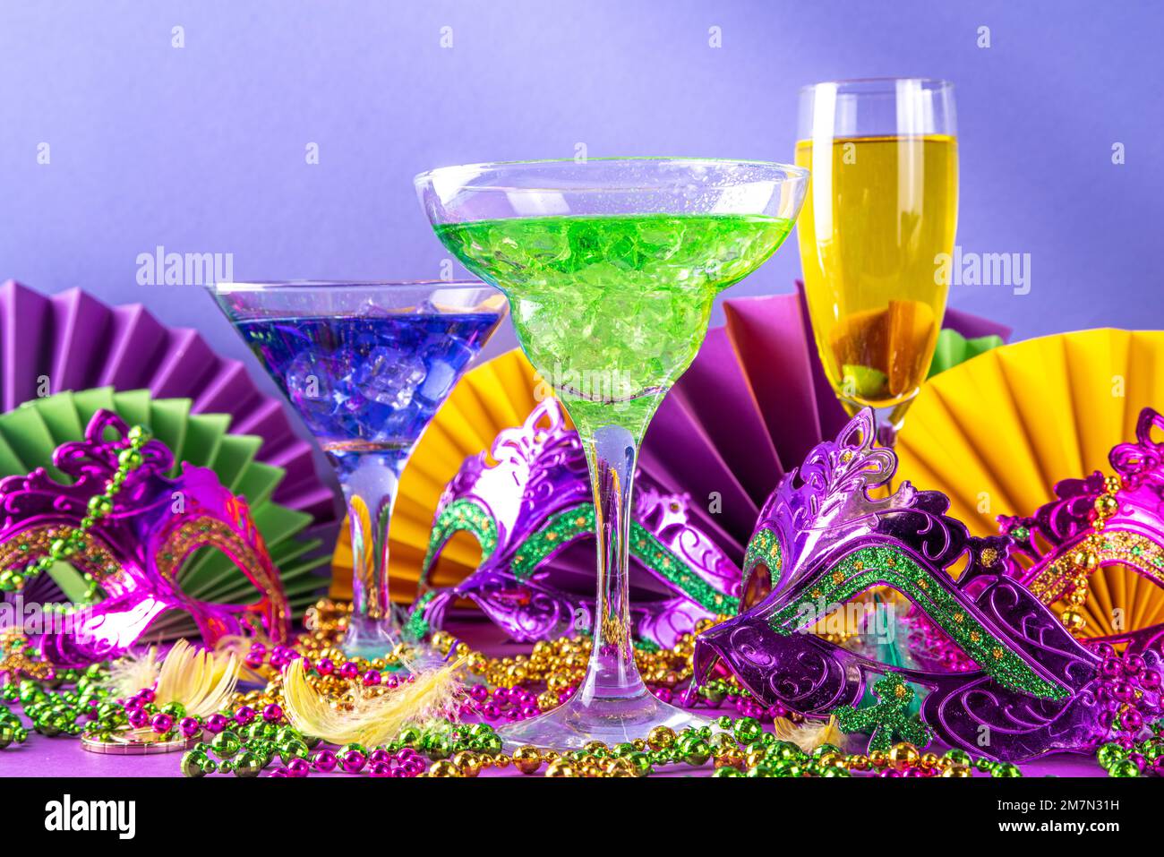 Mardi gras cocktails set. Colorful purple, yellow, green martini ...