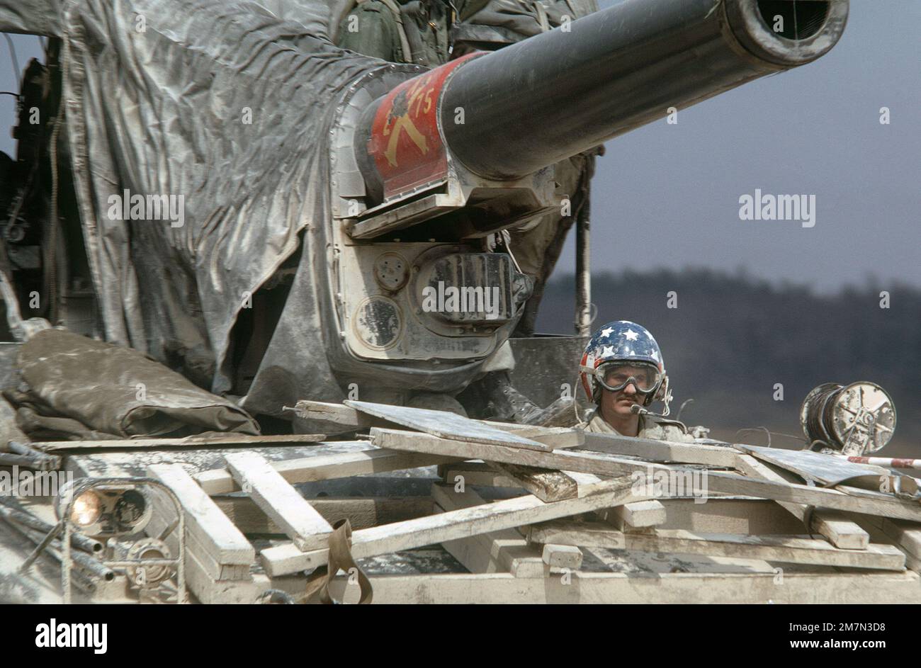 The driver maneuvers an M110 203 mm self-propelled howitzer during a ...