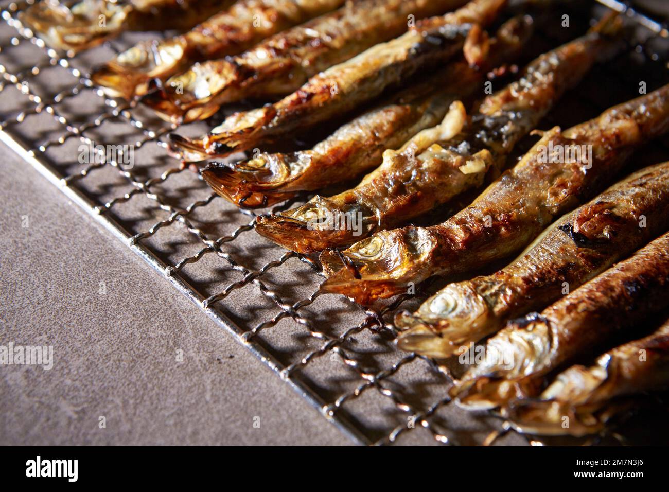 grilled fish on the grill Stock Photo - Alamy